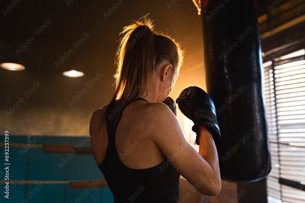 Women self defense girl power. Strong woman fighter training punches on ...