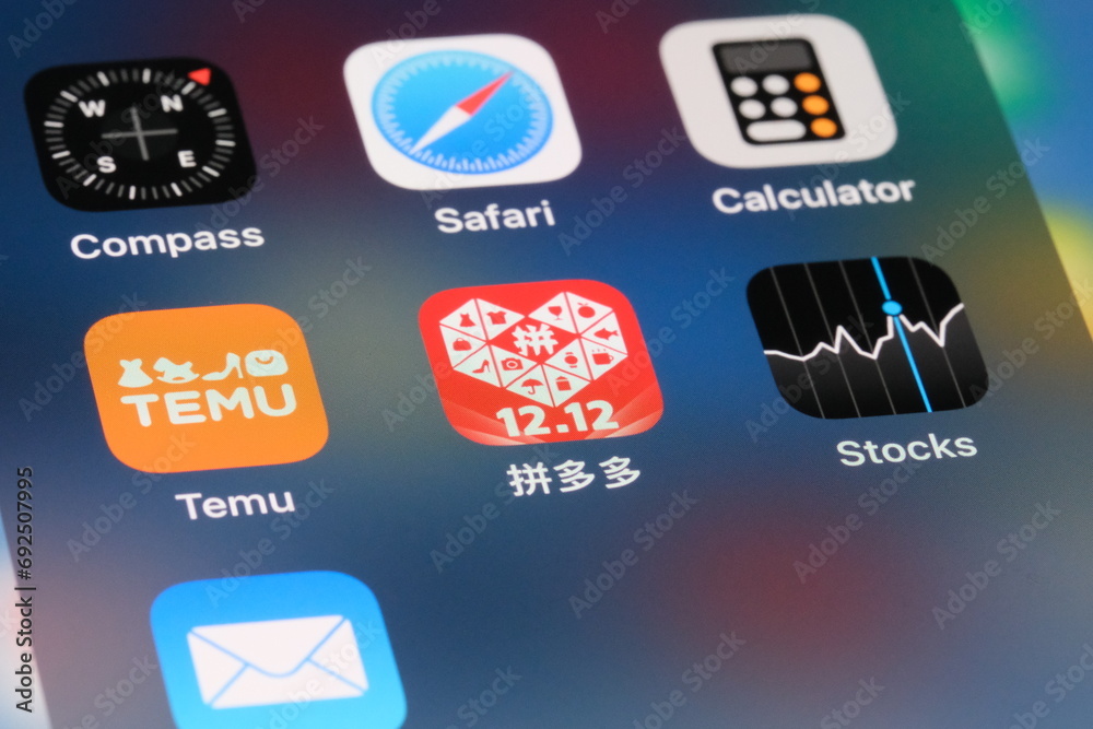 Shanghai,China-Dec.12 2023: Pinduoduo and Temu app icon logo. Both ...