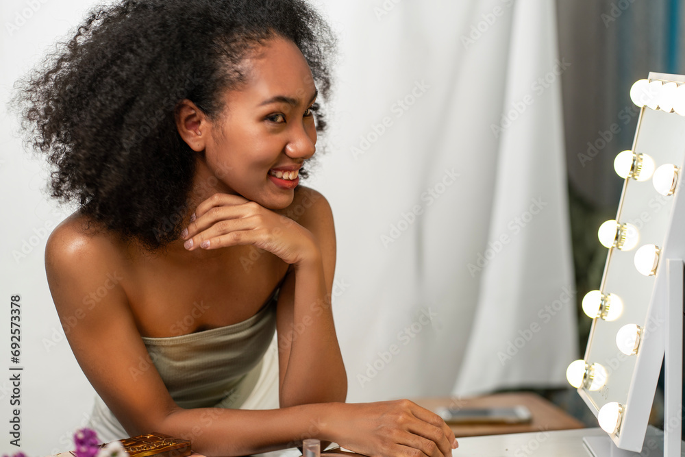 Young black woman of Asian and African American descent with curly hair ...