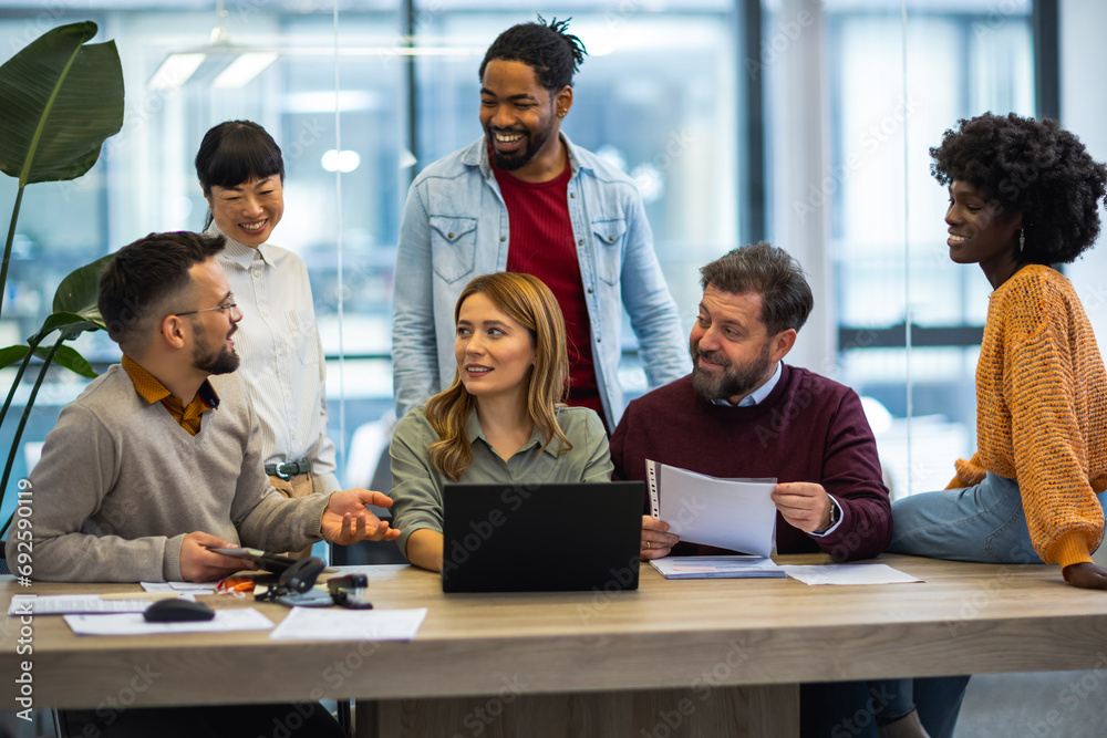 International workers group and team leader having teamwork discussion ...
