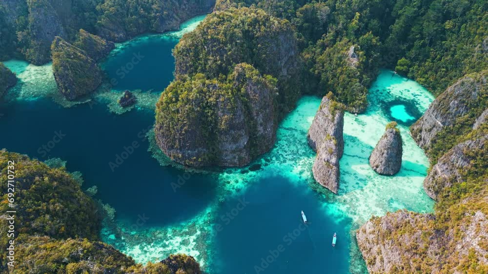 Aerial view of the South West Papua's seascape with blue lagoons and ...