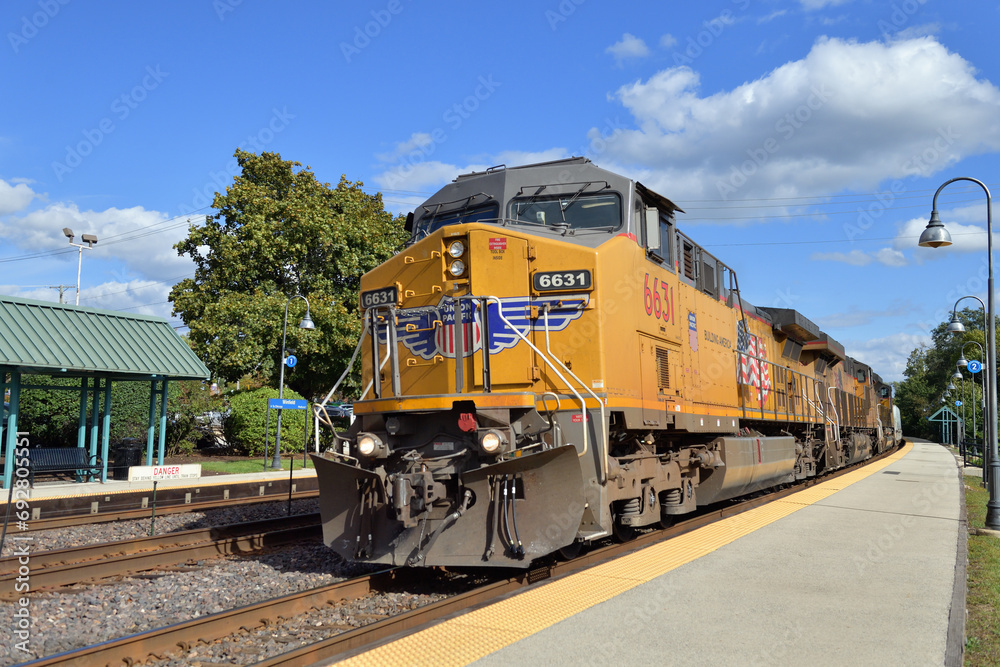 A westbound Union Pacific Railroad freight train passing through a ...
