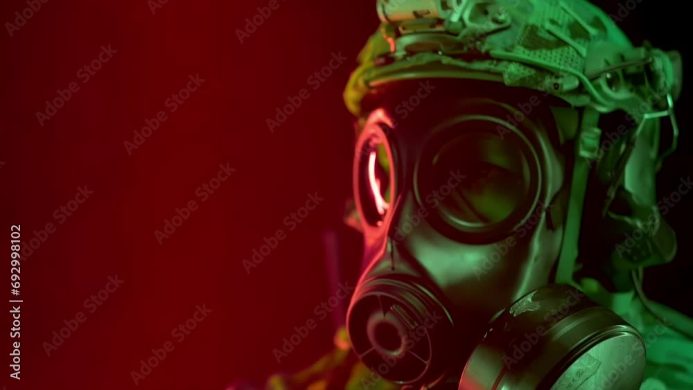 Military soldier in army camouflage, warrior in protective gas mask and ...