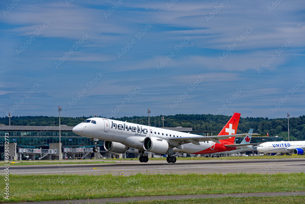Helvetic Airways airplane Embraer E190-E2 register HB-AZF taking off ...