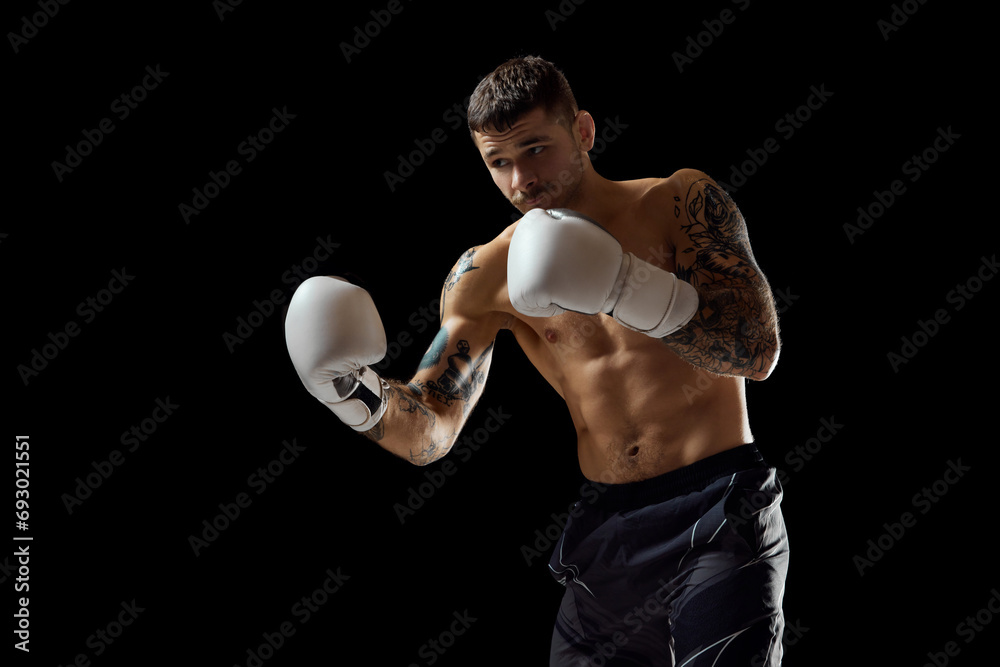 Hook. Muscular, shirtless young man, boxer training, fighting isolated ...