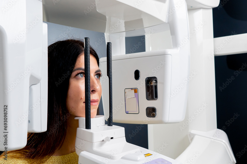 portrait of a beautiful woman doing a 3D scan of the nose and oral ...