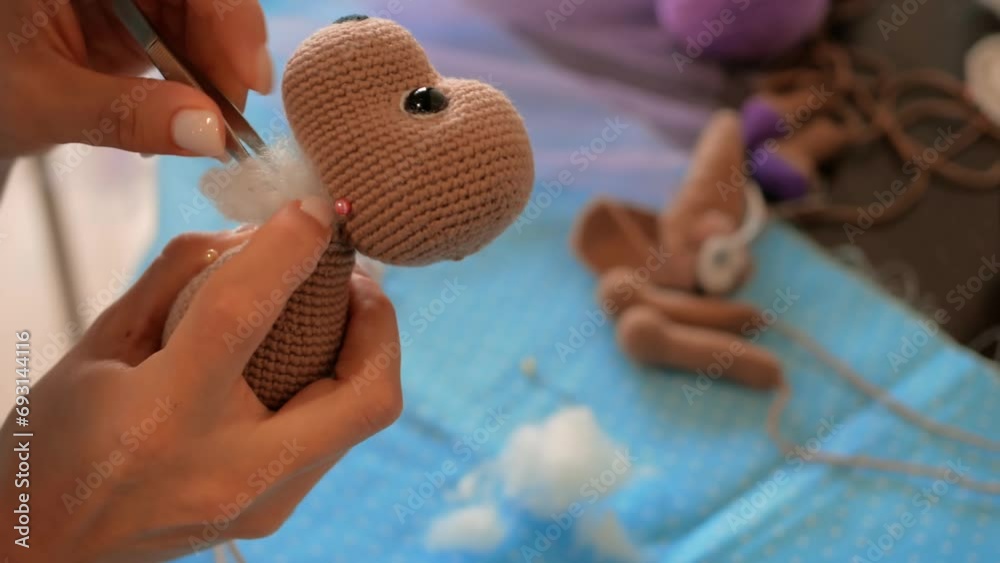 Stockvideon Stuffing toy, meticulous craft handiwork. art toy-making ...