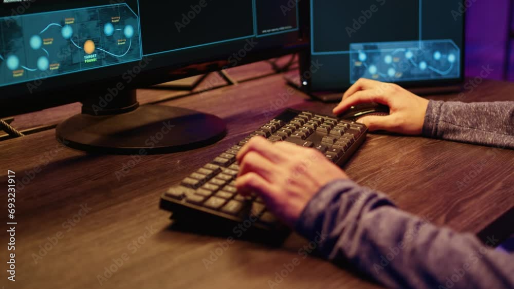 Hacker in secret underground shelter typing on keyboard, writing lines ...