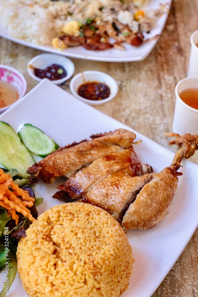 Crispy-skin chicken Maryland with tomato rice and combination broken ...