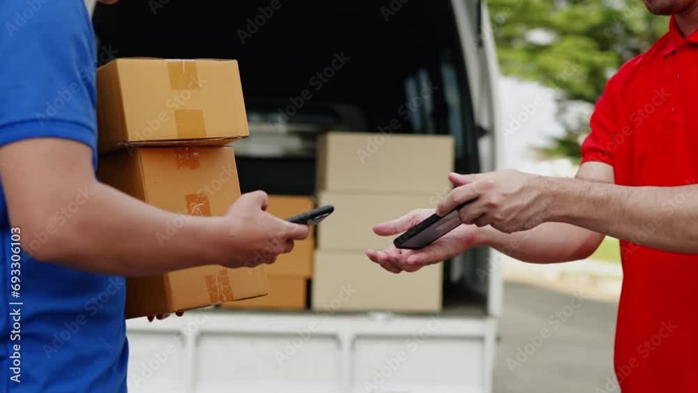 Delivery man, driver in red orange uniform is sending parcel box ...