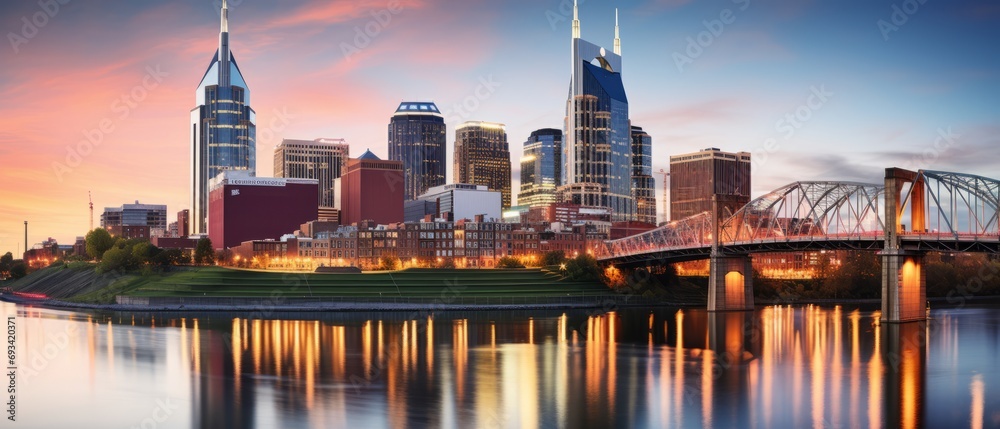 nashville skyline illuminated at dusk with vibrant city lights and ...