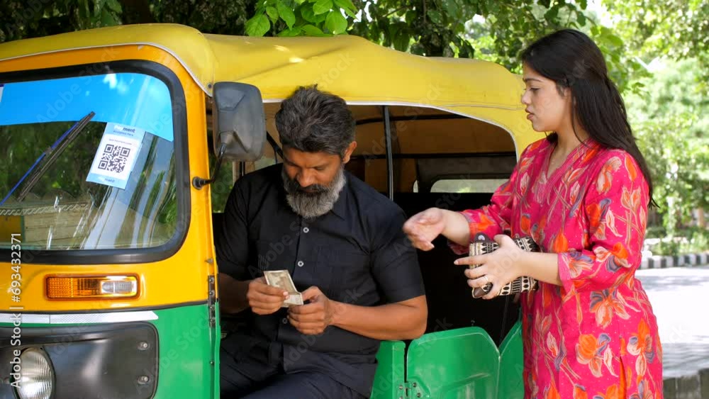 An office-going girl paying money to an auto rickshaw driver - Indian ...