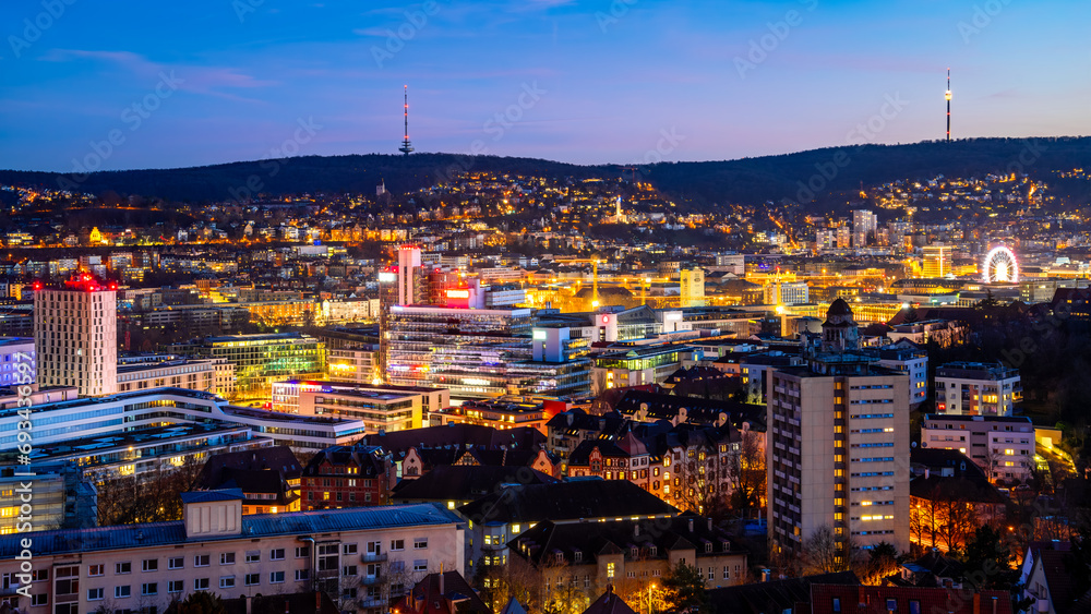 Stuttgart nighttime panorama with colorfully illuminated buildings in ...