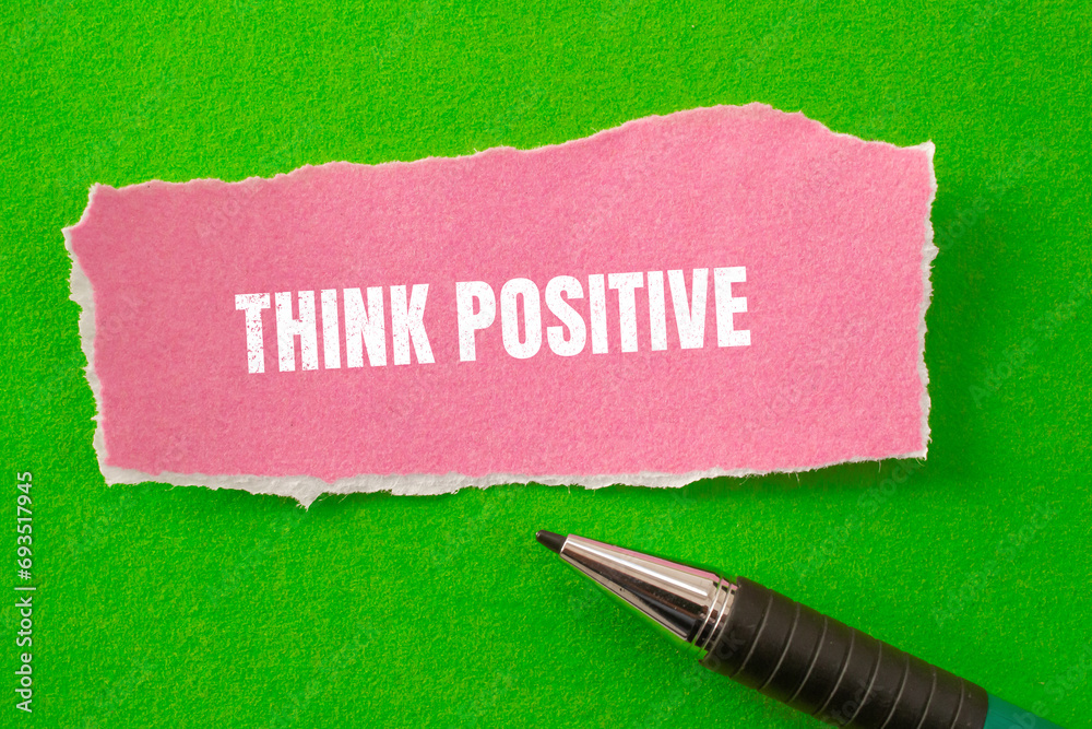 Think positive lettering on ripped paper. Motivational concept photo ...