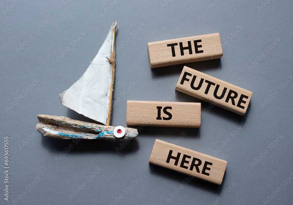 The future is here symbol. Concept words The future is here on wooden ...