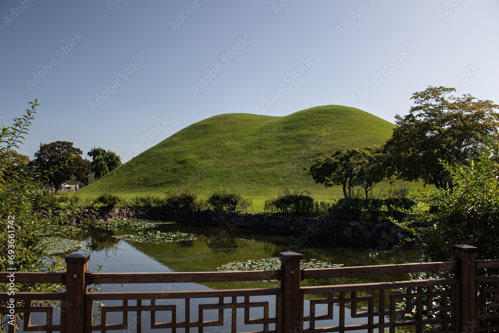Daereungwon Tomb Complex in Gyeongju, South Korea, showcasing lush ...