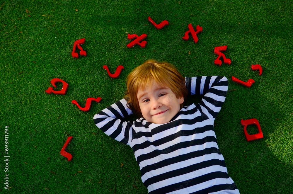 Letters of the Hebrew alphabet. A boy learns Hebrew. Ulpan for children ...