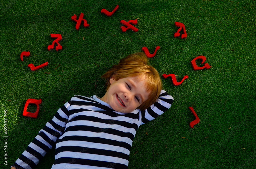 Letters of the Hebrew alphabet. A boy learns Hebrew. Ulpan for children ...