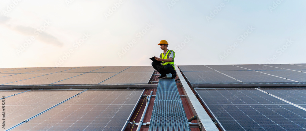maintenance in solar panel on roof ; engineering working on checking ...