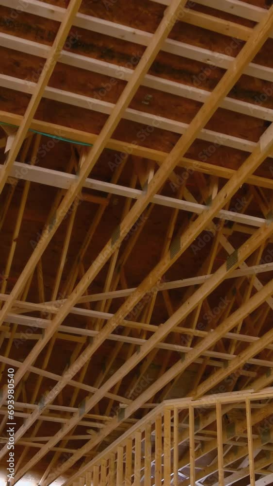 Roofing rafters, joist trusses, support beams on new residential construction Stock Video ...