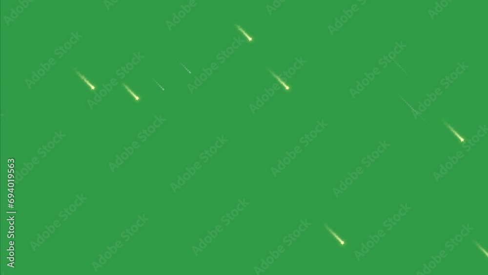 Stars in the night sky twinkle and blink as they fall on a green screen ...