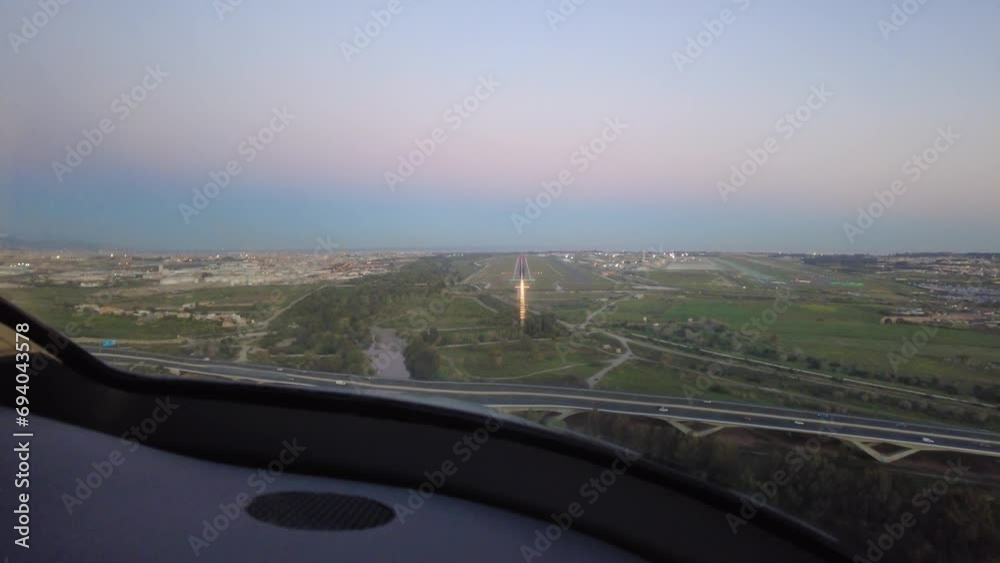 airplane aircraft jet full final approach and landing at airport runway ...