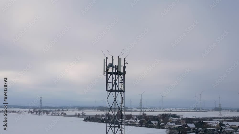 5G mast Cell Tower mobile, cold Winter Snow. Stunning aerial view ...