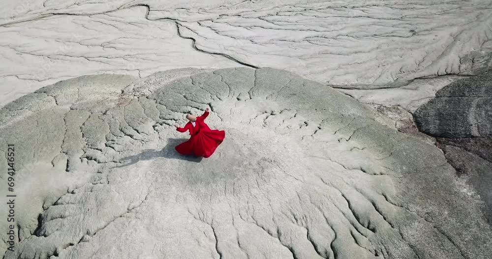 Semazen (dervish) is dancing in the traditional red dress. Whirling ...