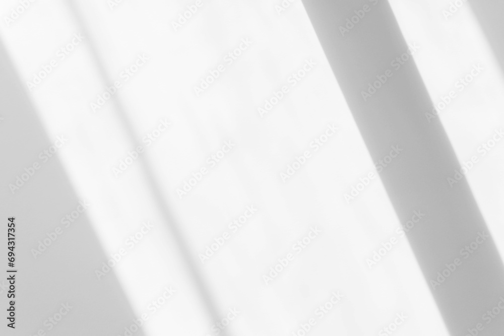 White wall with shadow of chair and curtain overlay. Sunlight effect ...