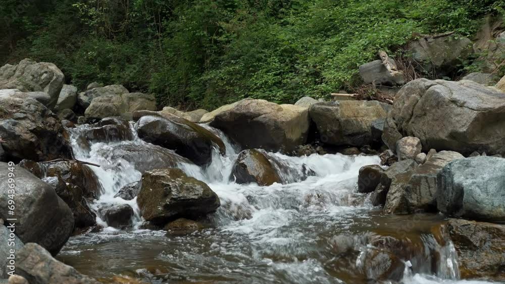 Creek, stream or small and quick mountain river with crystal clear ...