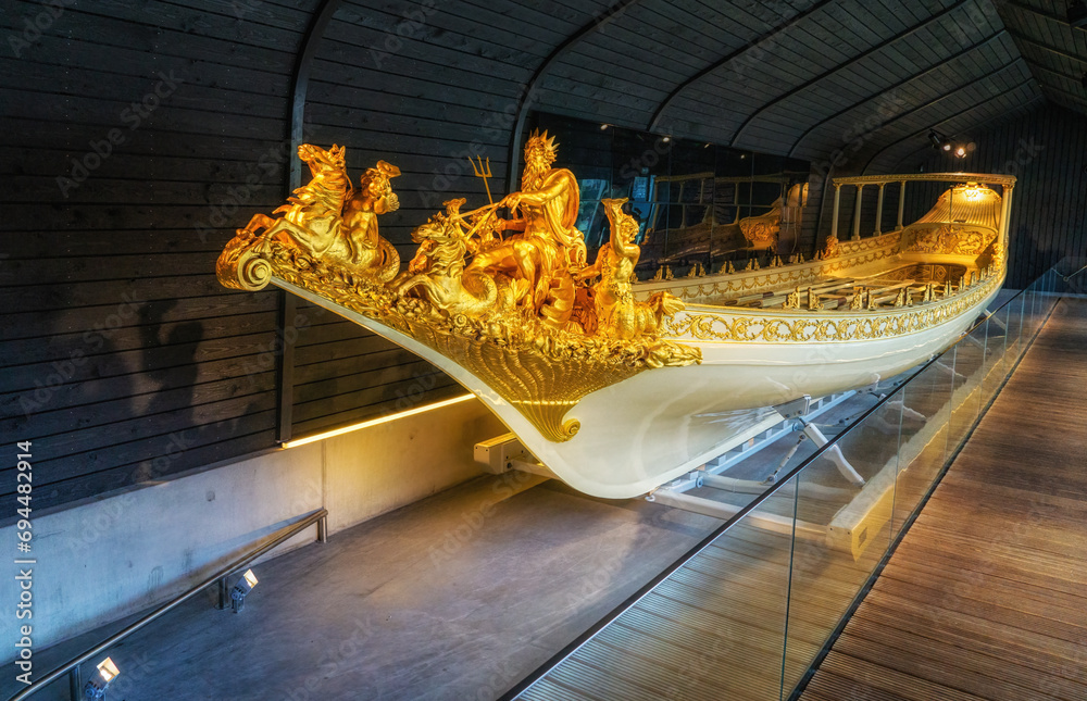 Gold statue on bowsprit of baroque dutch medieval royal boat in The ...