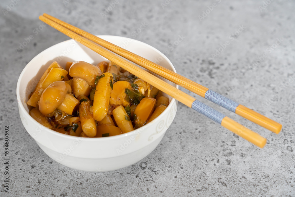 Korea Tteokbokki or simmered rice cake with mushroom and sauce. Stock ...