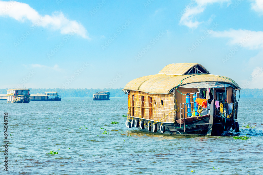 Indian traditional floating houseboats homes on Pamba river backwaters ...
