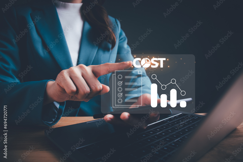 Businesswoman pointing down arrow of the graph with cost reduction ...