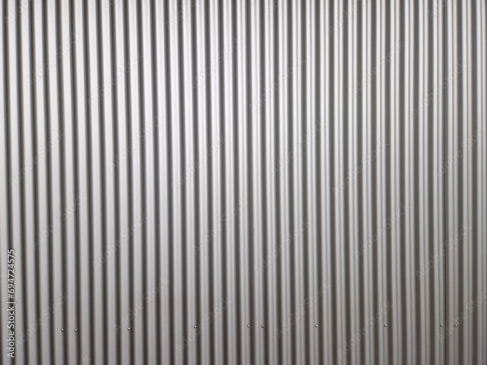 building is lined with square panels. metal sheet wall cladding with ...