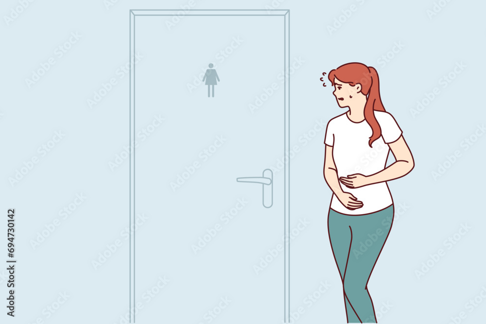 Woman suffering from diarrhea rushes to toilet standing near closed ...