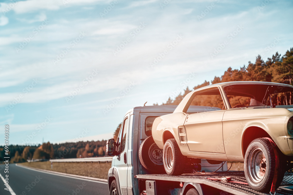 A Vintage American Muscle Car Body on a Tow Truck. A Restoration ...