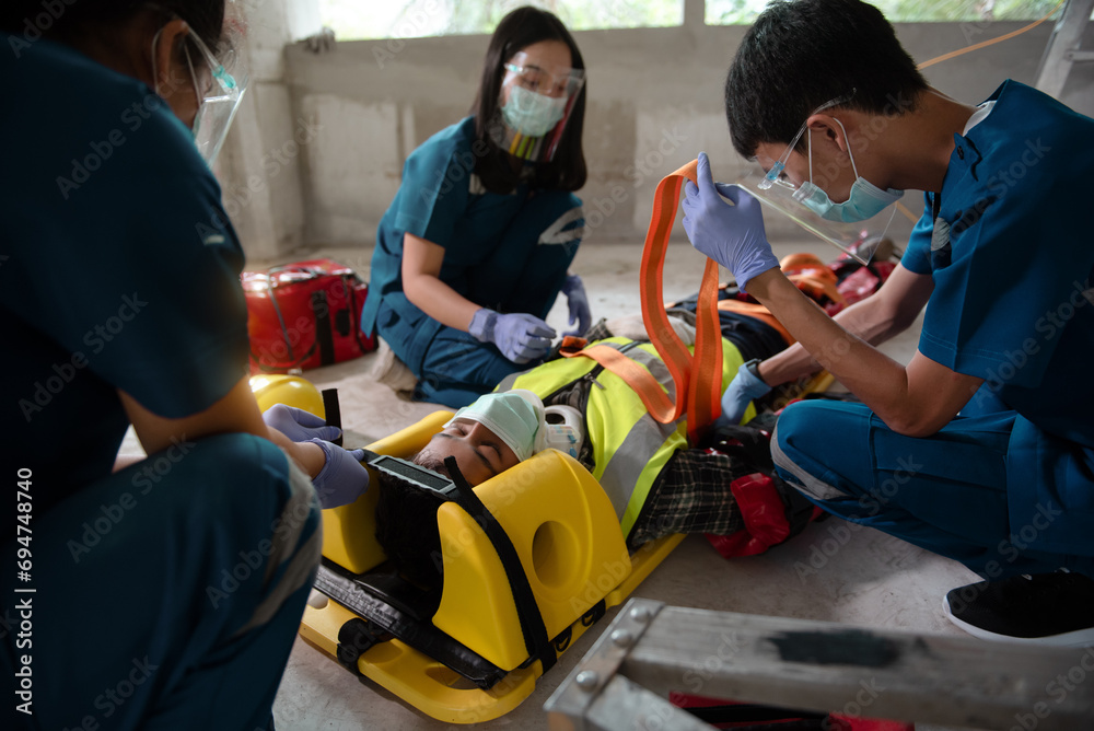 First aid for injuries in work accidents. Using first aid equipment ...