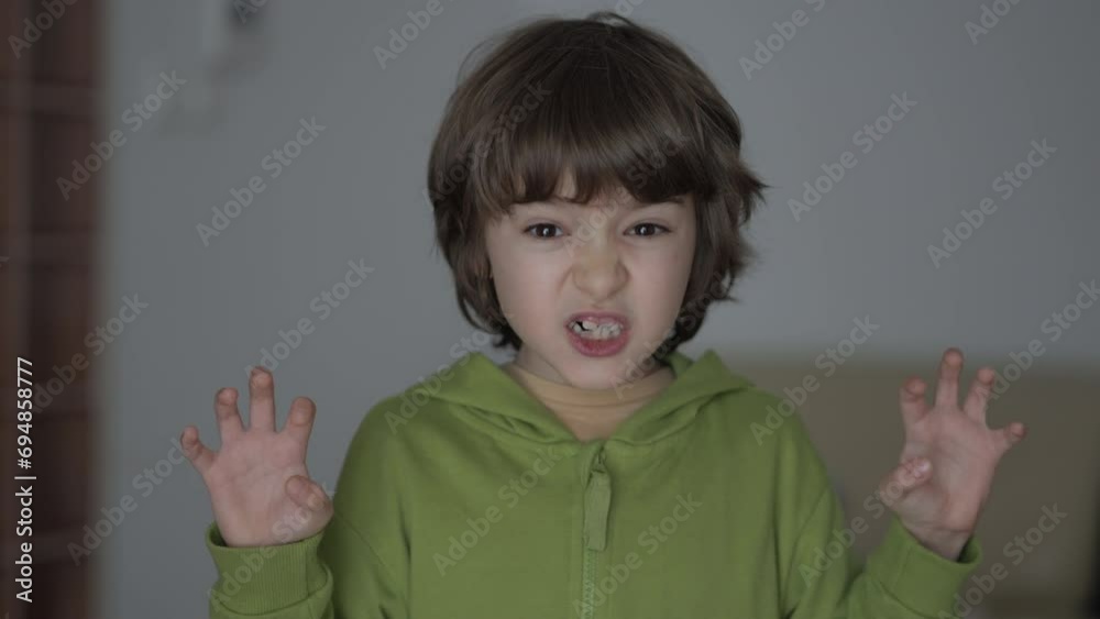 Funny Child with Angry Scary Face and Hands. Young Cute Boy Making ...