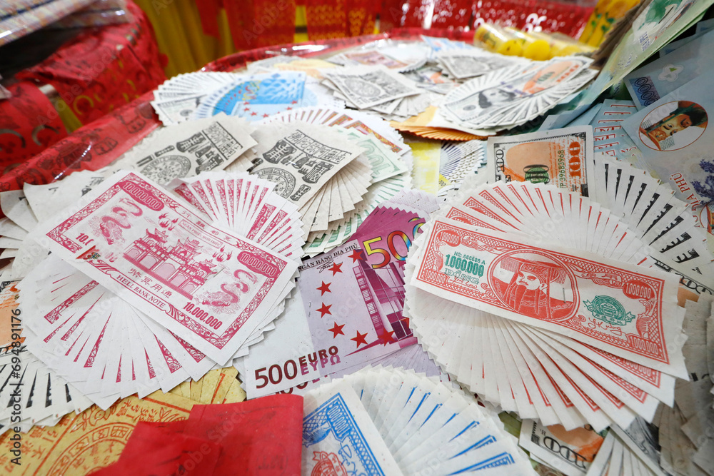 Burning hell bank notes and other forms of joss paper for Buddhist and ...
