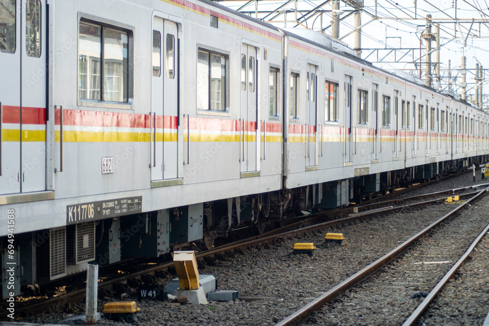 commuter line at the departure station. railway with train photography ...