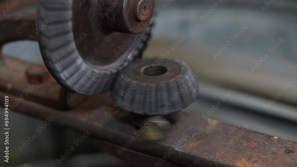 Extraction of honey from honeycombs of nesting frames in honey ...