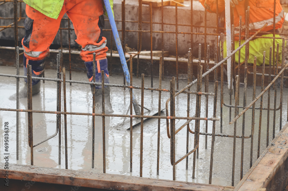 Concrete cast-in-place work. Builder level wet concrete. Concrete works ...