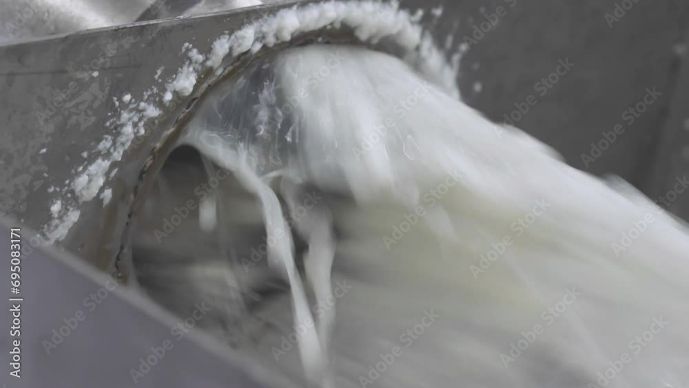 Vidéo Stock Industrial Dairy Factory Close Up Of Milky Whey Falling ...