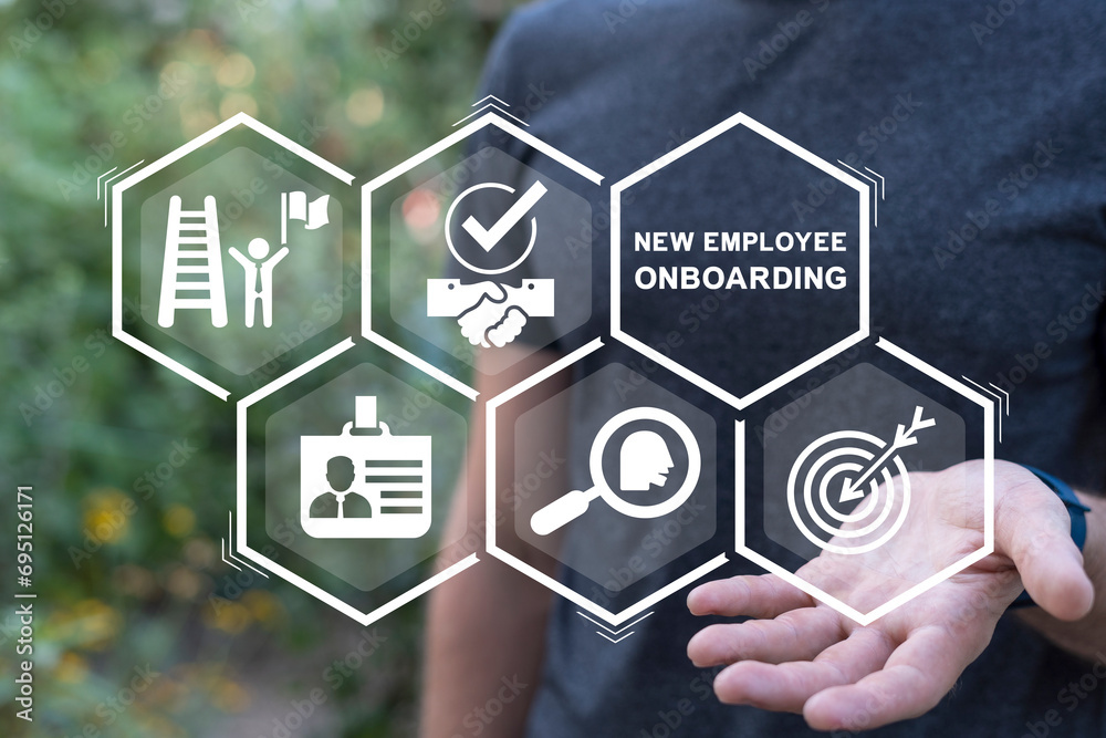 Man using virtual touch screen sees text: NEW EMPLOYEE ONBOARDING ...