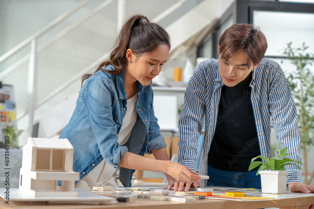 Elevate your projects with vibrant images of young Southeast Asian teamwork seamlessly blending ...