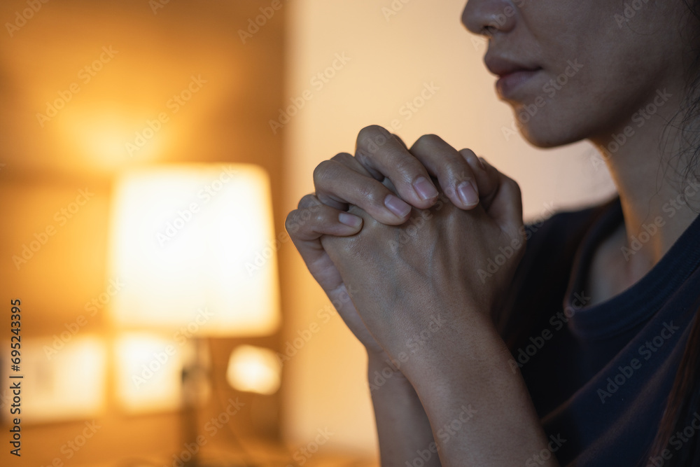 Christian woman praying in bedroom, woman hands praying to god, begging ...
