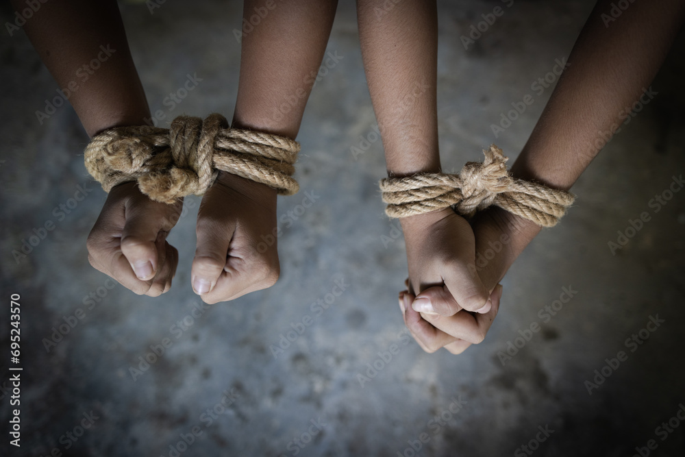 Hopeless man hands tied together with rope, child labor concept, poor ...