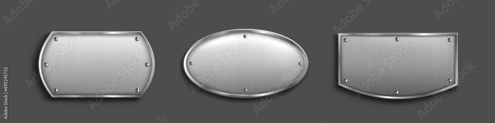 Set of steel tags with blank metal surface isolated on black background ...