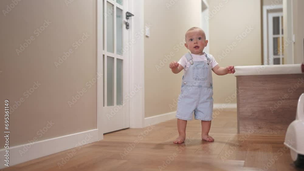 baby first steps. son a baby toddler learning to walk take first steps ...